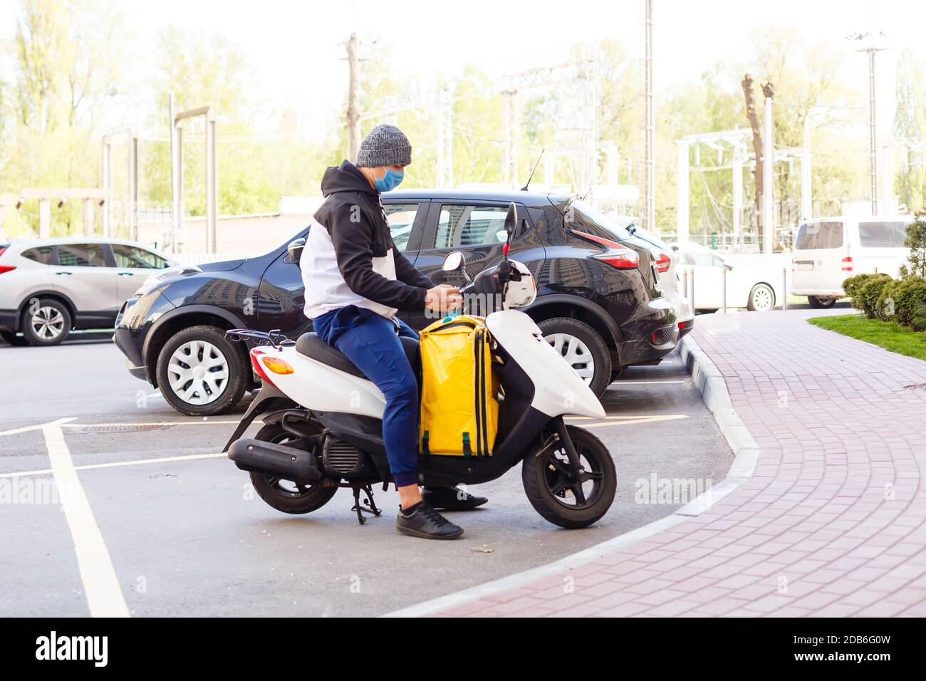 contactless food delivery to customers home. Delivery service worker ...