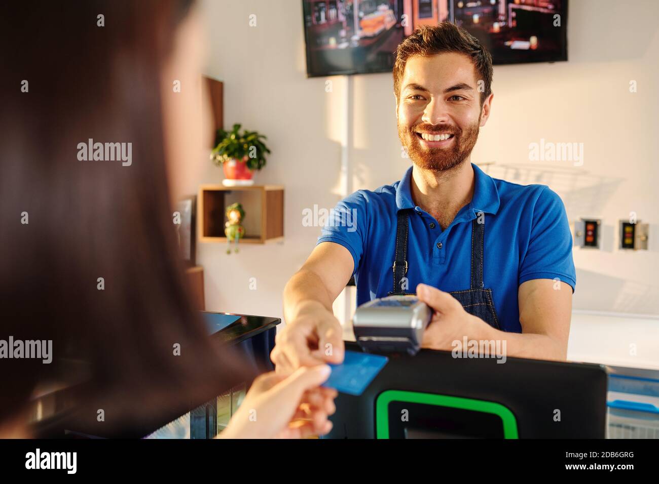 Cashier barista hi-res stock photography and images - Alamy
