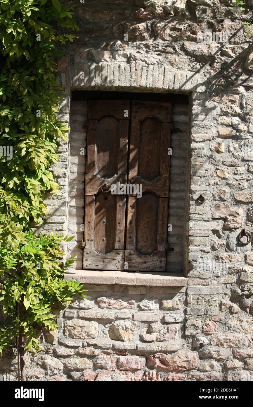 Window in the old stone wall Stock Photo - Alamy