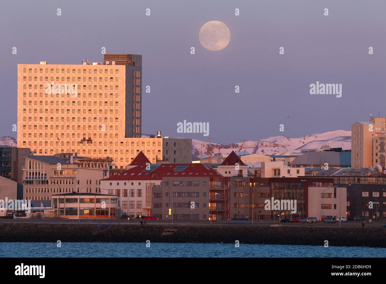 Evening view of Reykjavik with full Moon in the sky, sunset light Stock ...