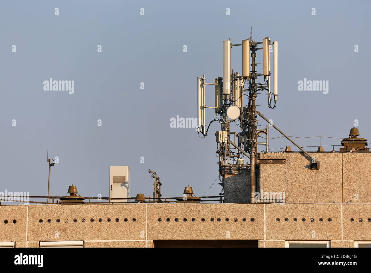 Signal transmitters for mobile network on a building roof Stock Photo ...