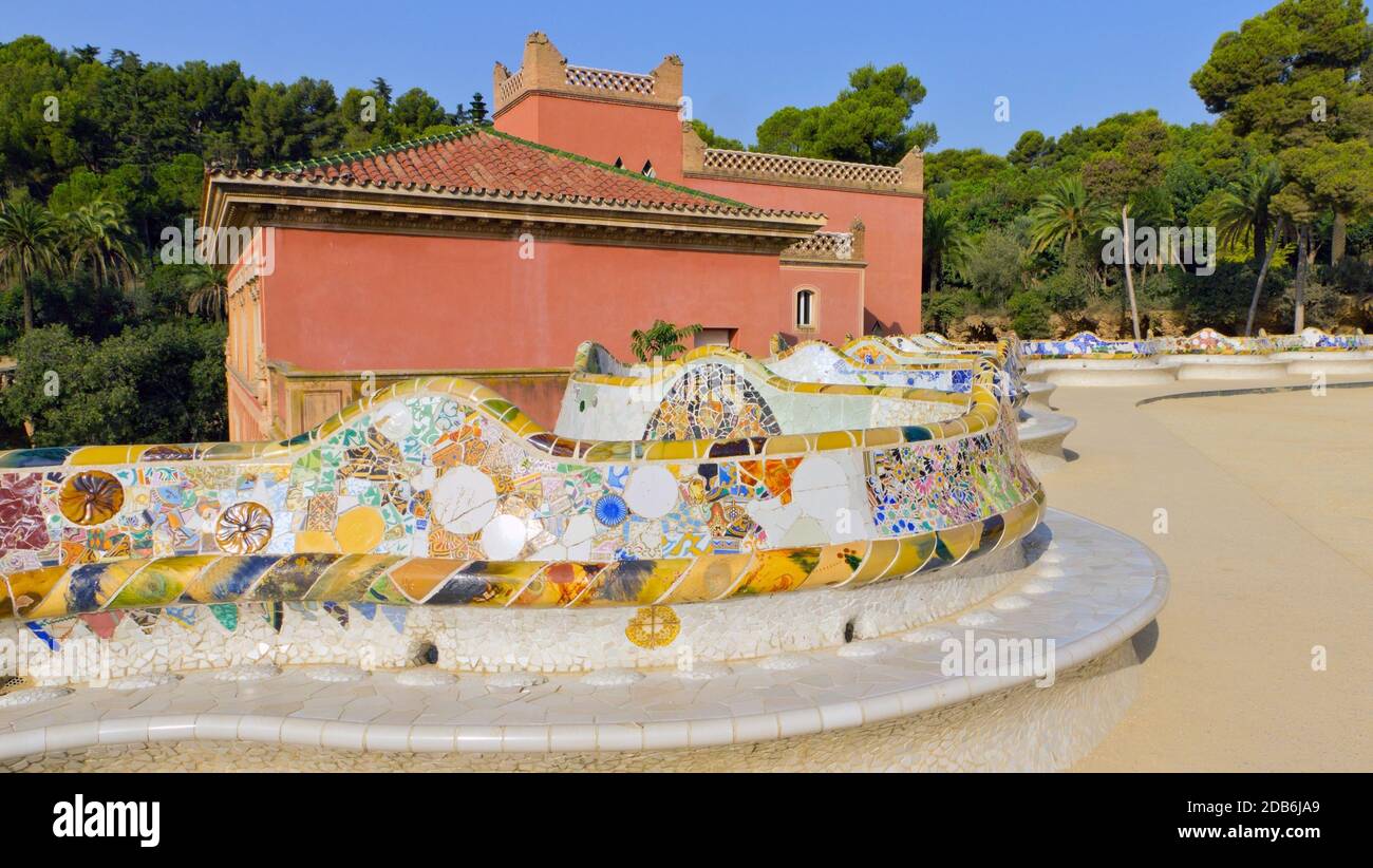 Mosaic snake bench on stone gallery in the park Guell in Barcelona ...