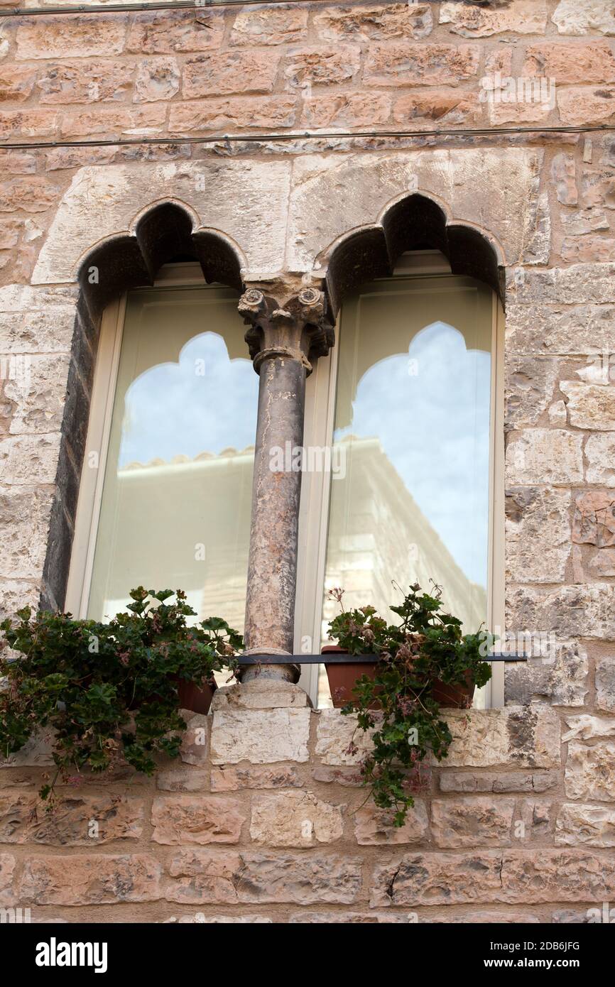 The Flowers on the old Tuscan Window Stock Photo - Alamy