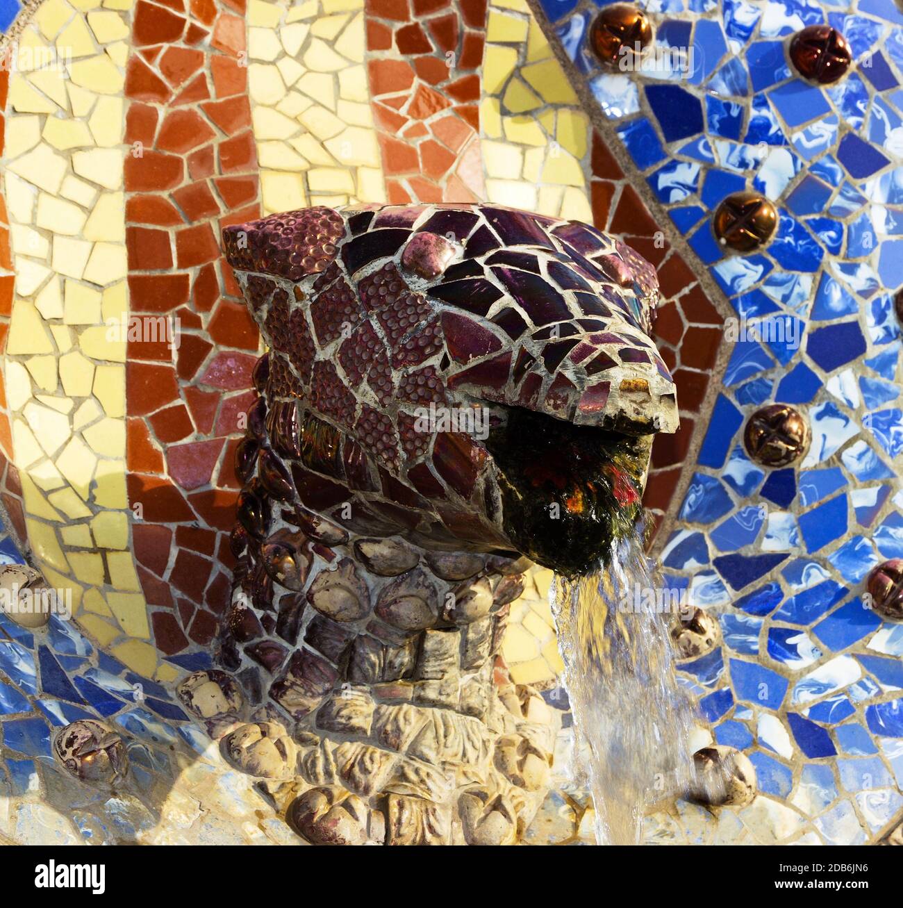 fountain mosaic tiles sculpture of a snake in Barcelona Stock Photo - Alamy