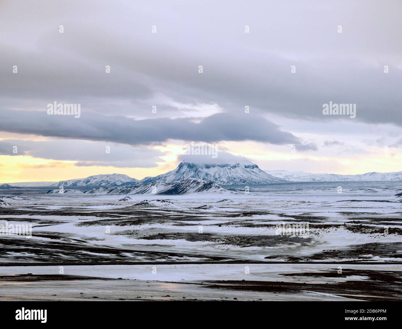 A crater and snowy apocalyptic landscape near Krafla power plant and ...