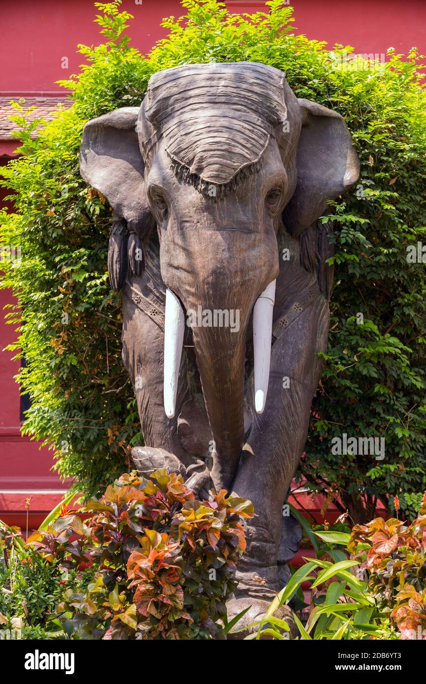 elephant statue with green shrub Stock Photo - Alamy