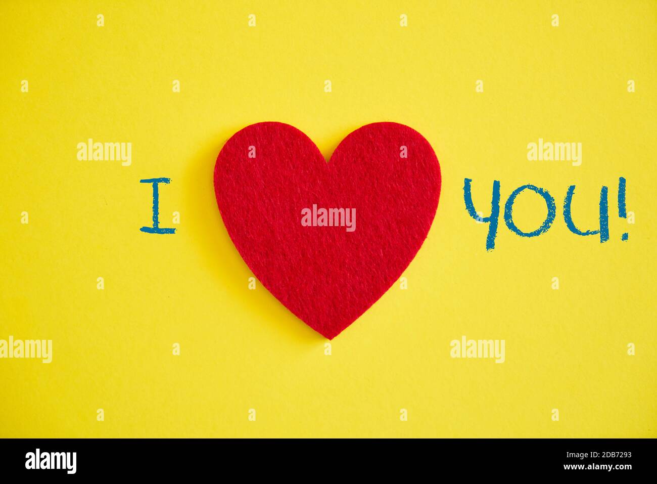 An "I love you" sign on yellow background Stock Photo - Alamy