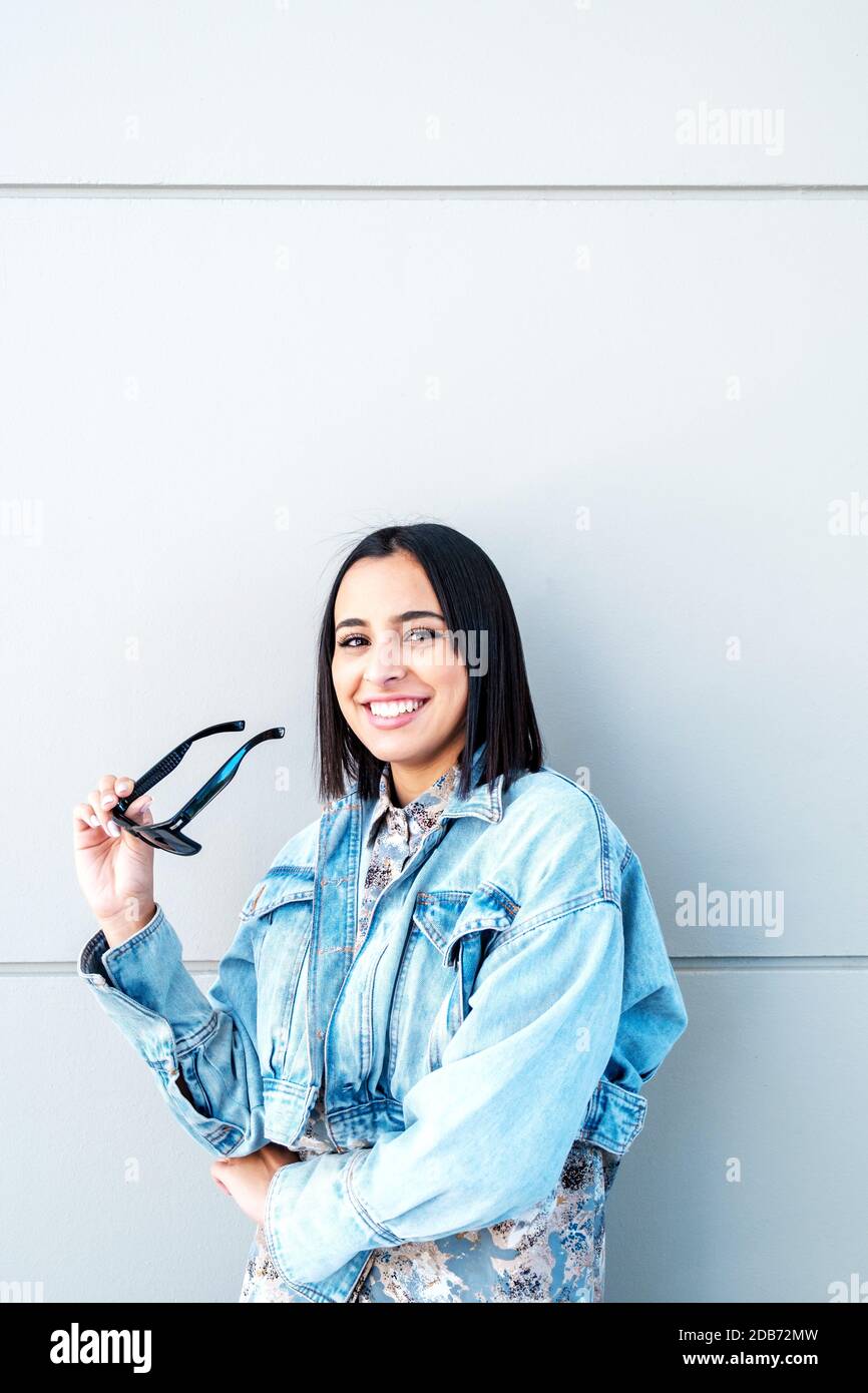 A vertical portrait of a beautiful young woman Stock Photo - Alamy