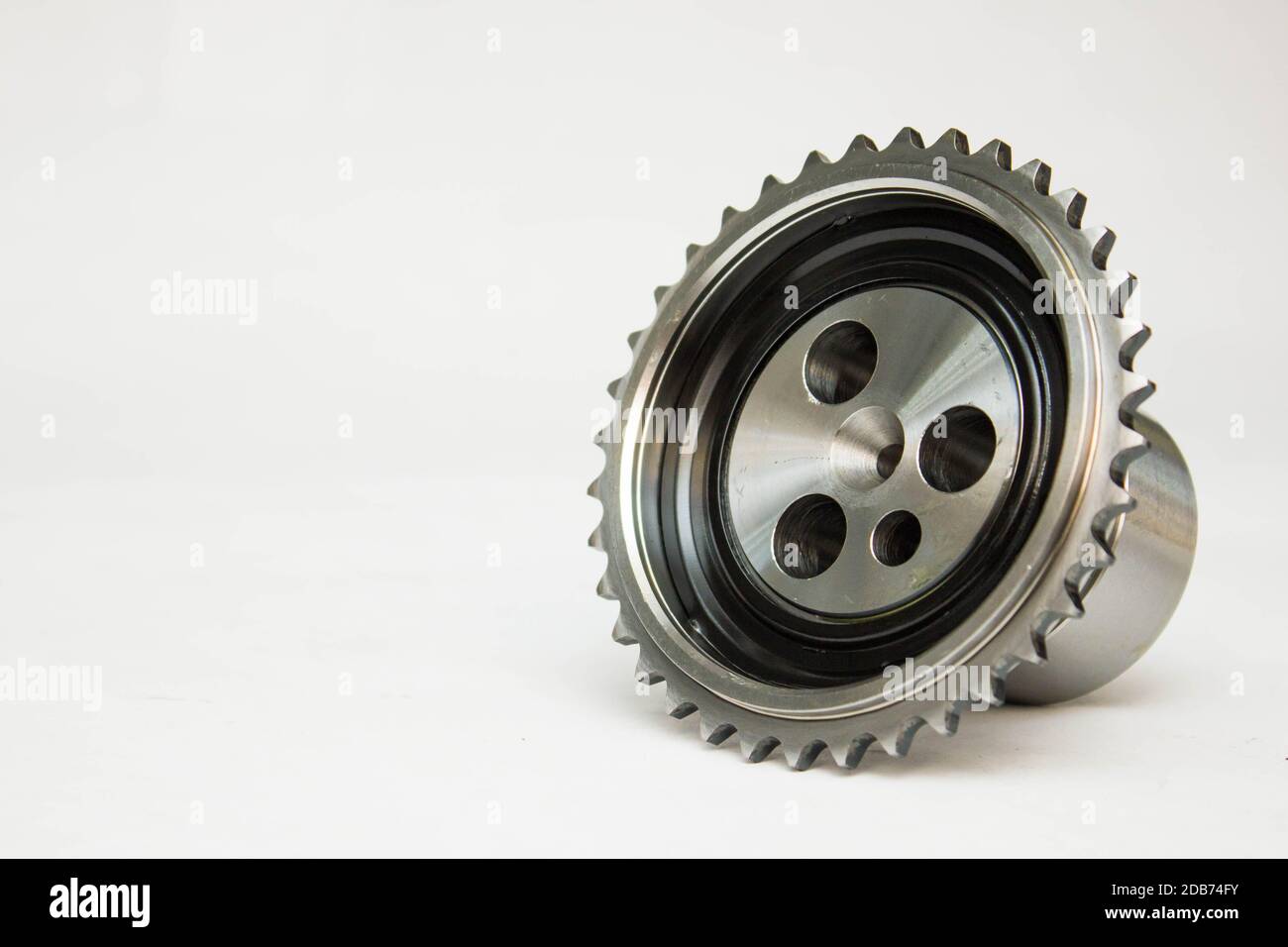 New details on a gray background. The camshaft gears Stock Photo - Alamy