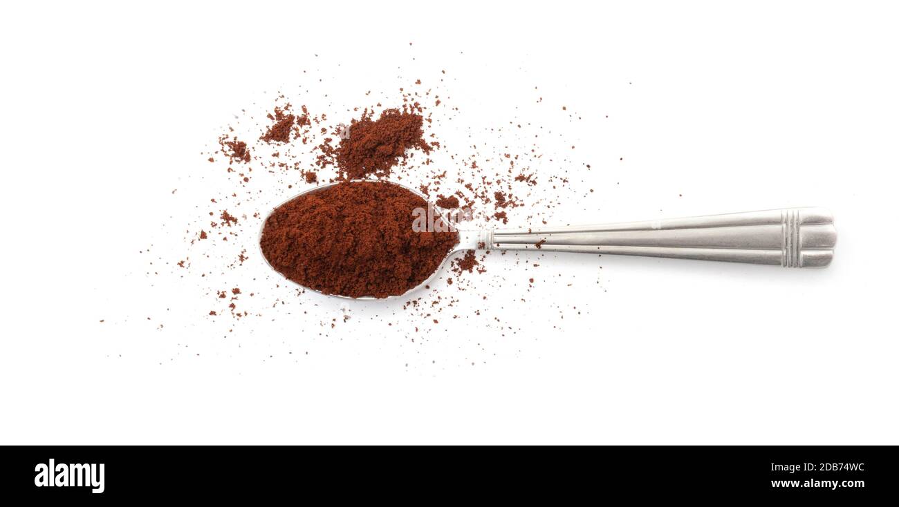Сoffee powder on spoon isolated on white background Stock Photo - Alamy