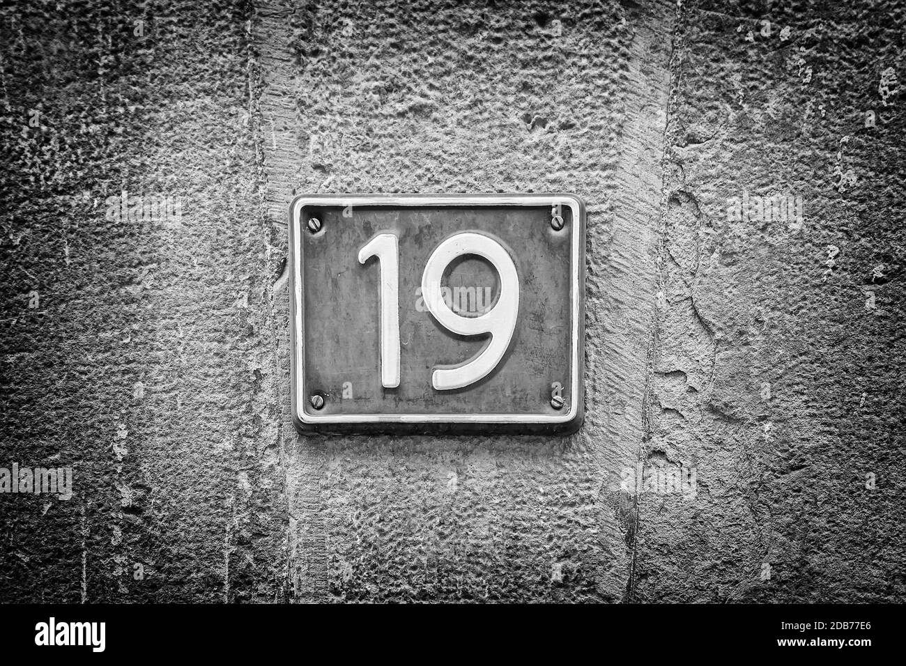 Number nineteen, detail of a metal plate with the number deiecinueve ...