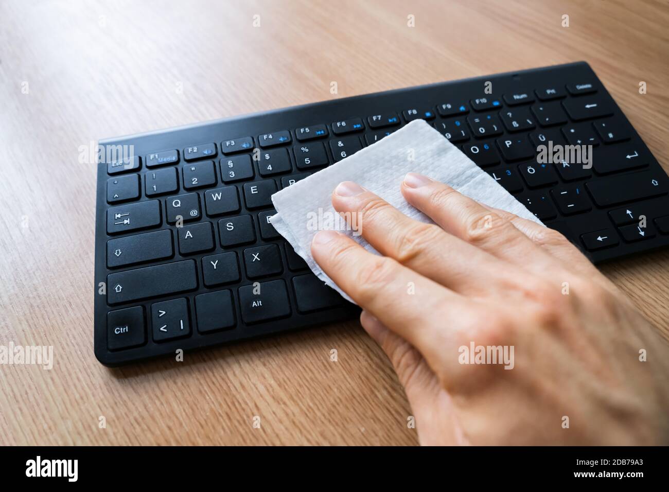 Man Wiping Computer Keyboard With Sanitizer Against Virus Infection ...
