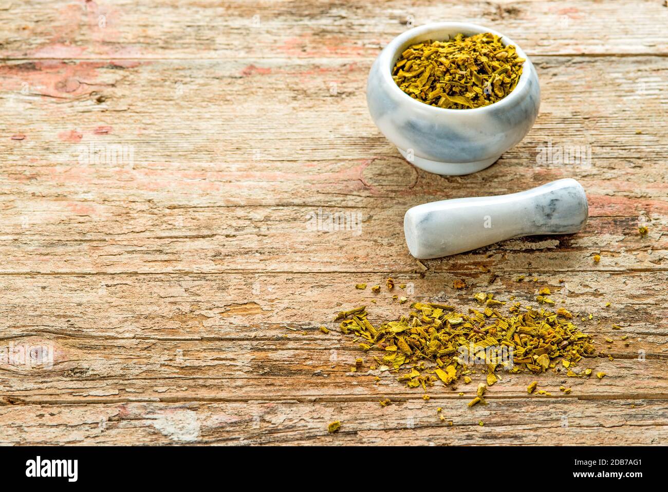 mistletoe, medicinal herb dried with mortar Stock Photo - Alamy