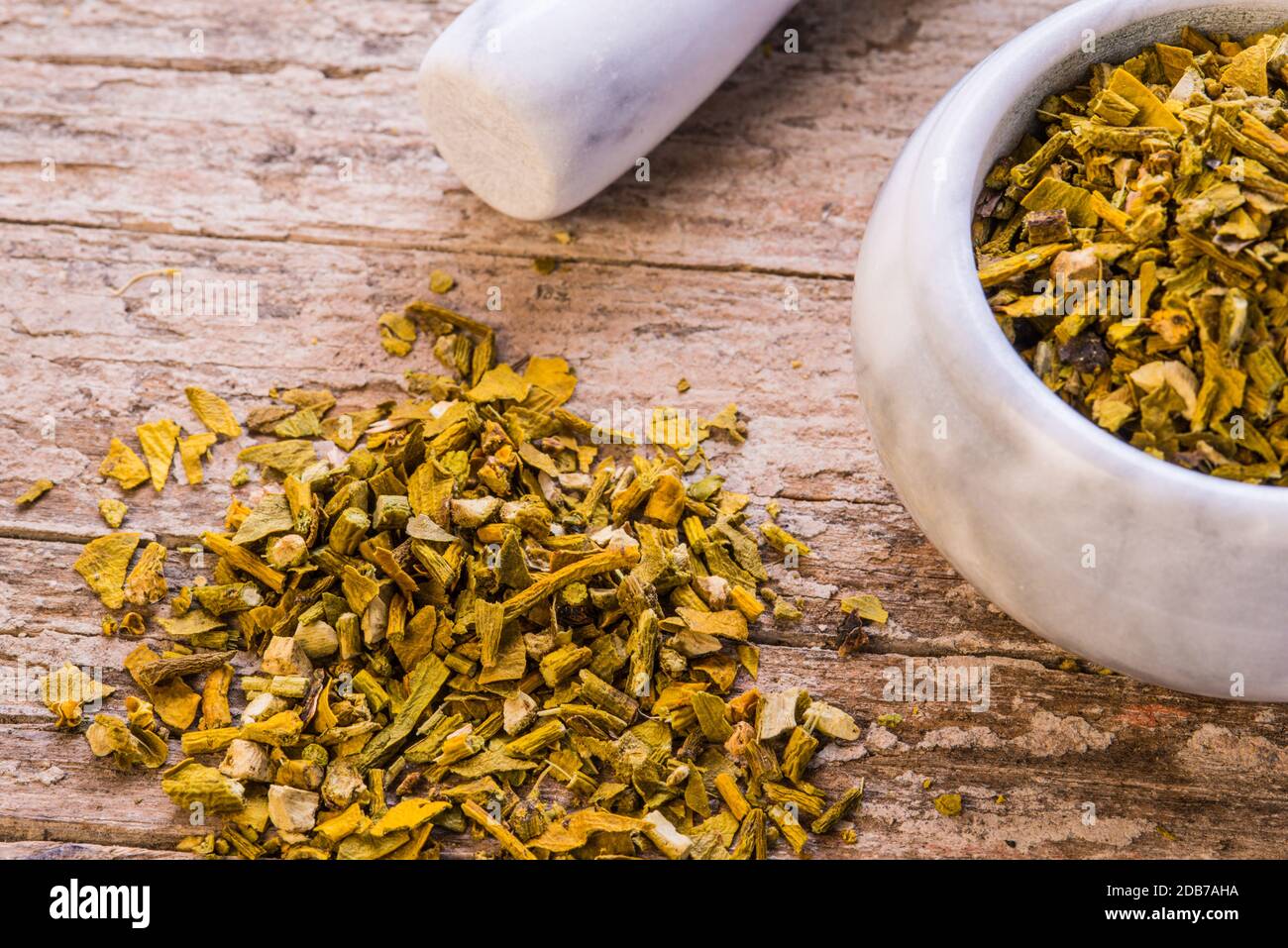 mistletoe, medicinal herb dried with mortar Stock Photo - Alamy