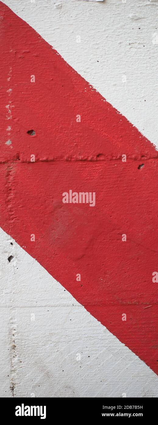 vertical Red and white safety stripes on a block of concrete Stock ...