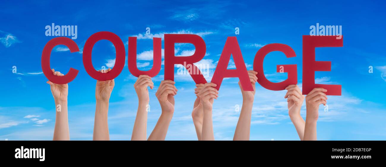 People Hands Holding Colorful French Word Courage Means Do Not Give Up ...