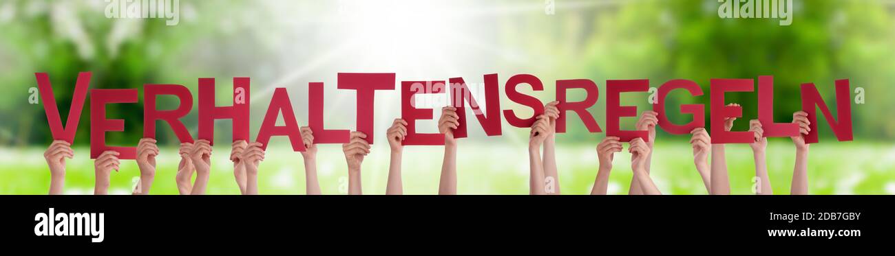People Hands Holding Colorful German Word Verhaltensregeln Means Code ...