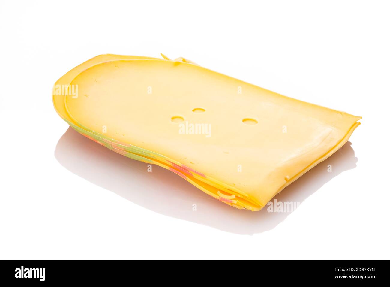 Slices of gouda cheese white isolated Stock Photo - Alamy