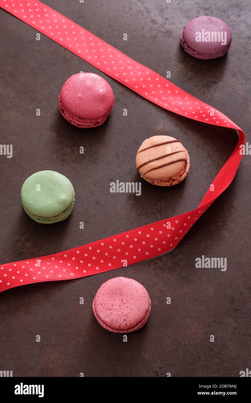 French speciality macarons in vertical format Stock Photo - Alamy