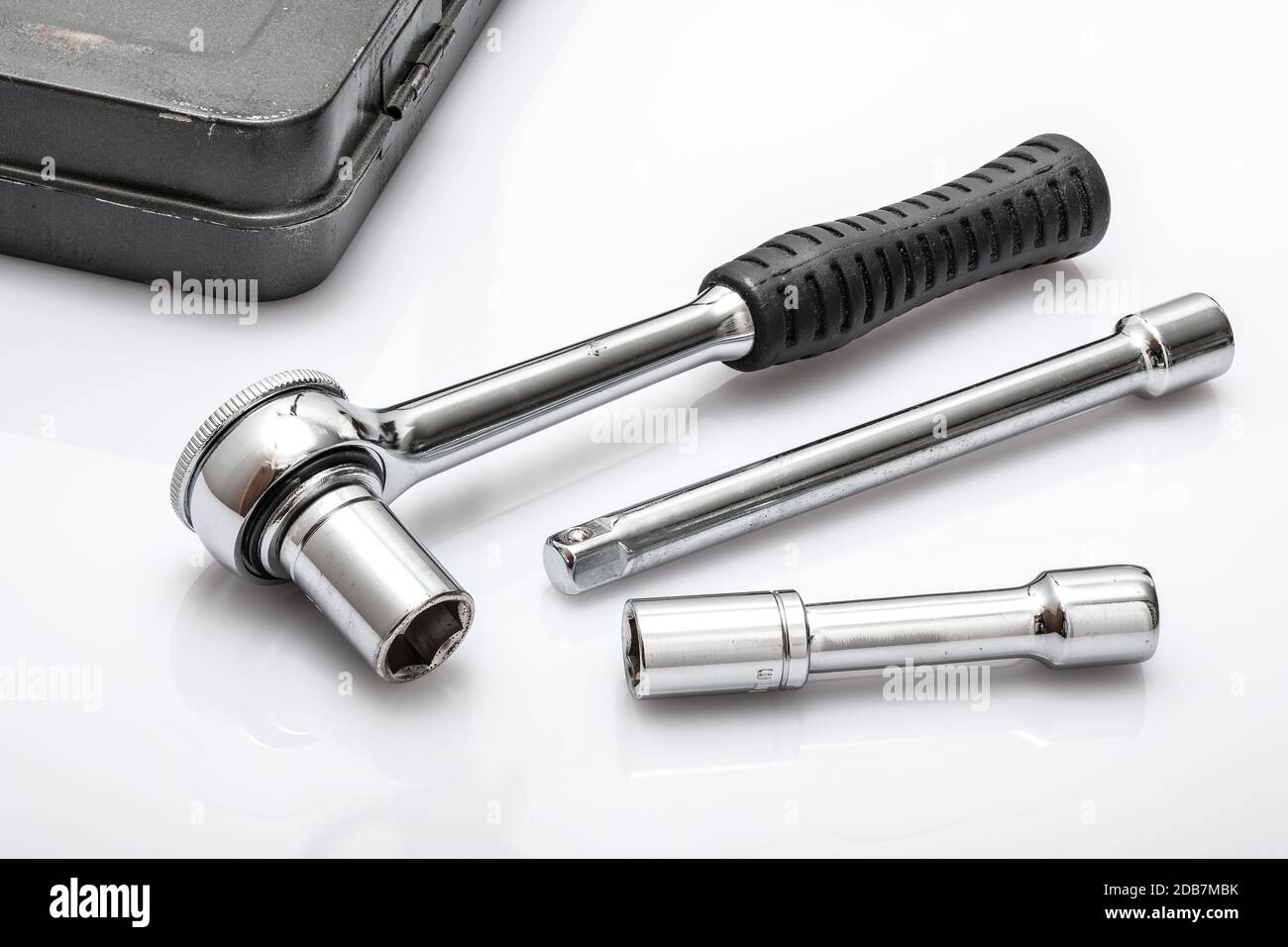 Ratchet with handle and socket and a tool box Stock Photo - Alamy