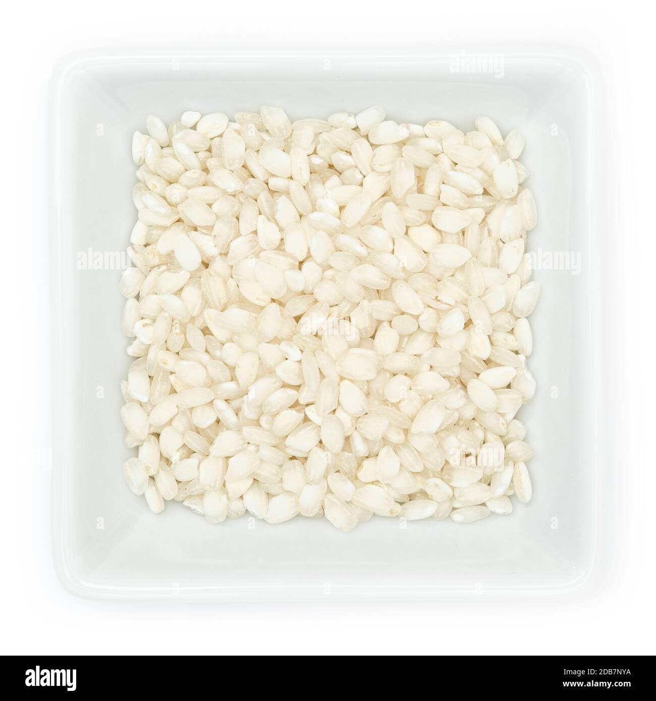 Italian rice risotto Vialone Nano in white bowl in top view Stock Photo ...