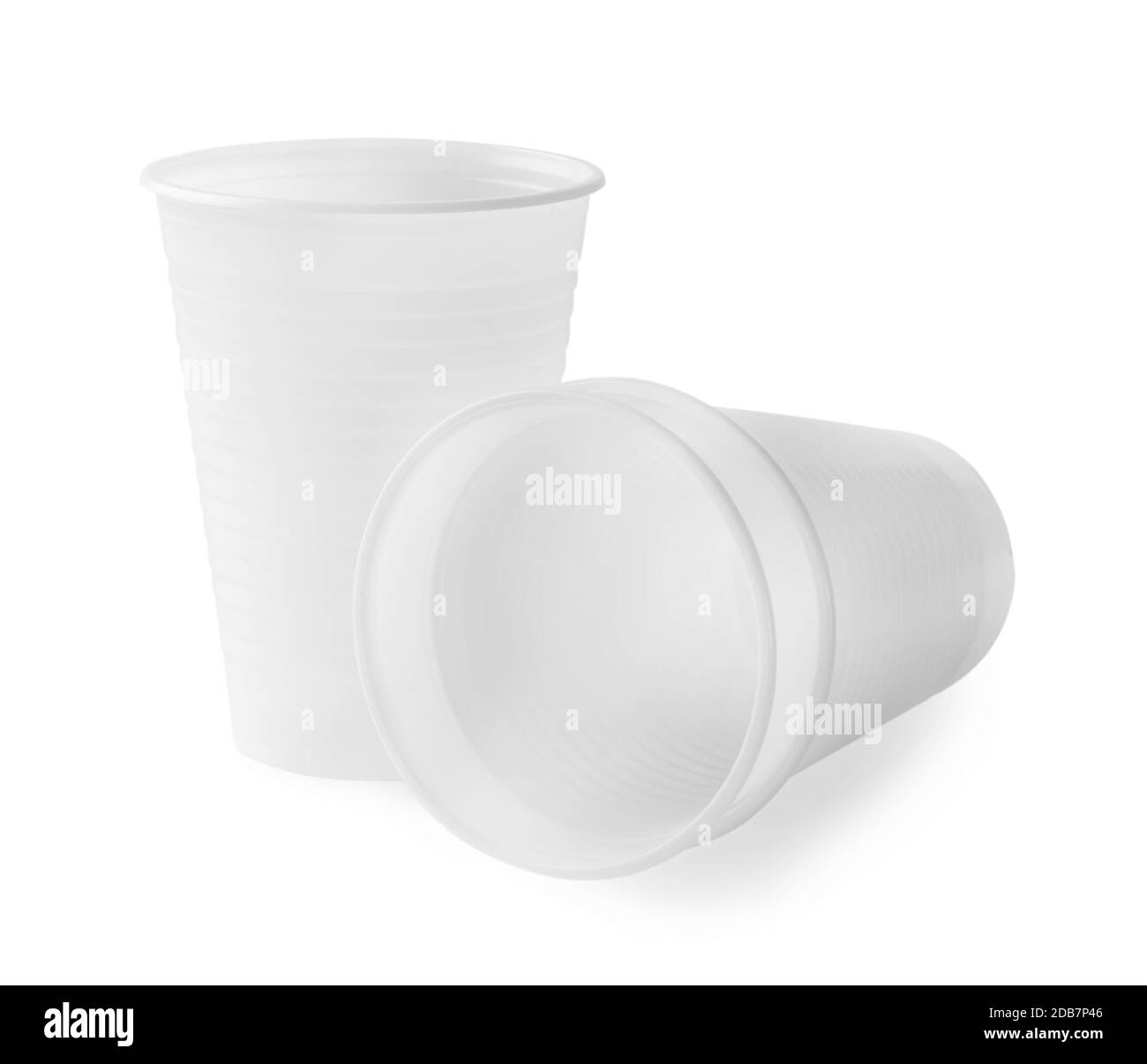 Three empty plastic cups isolated on white background Stock Photo - Alamy