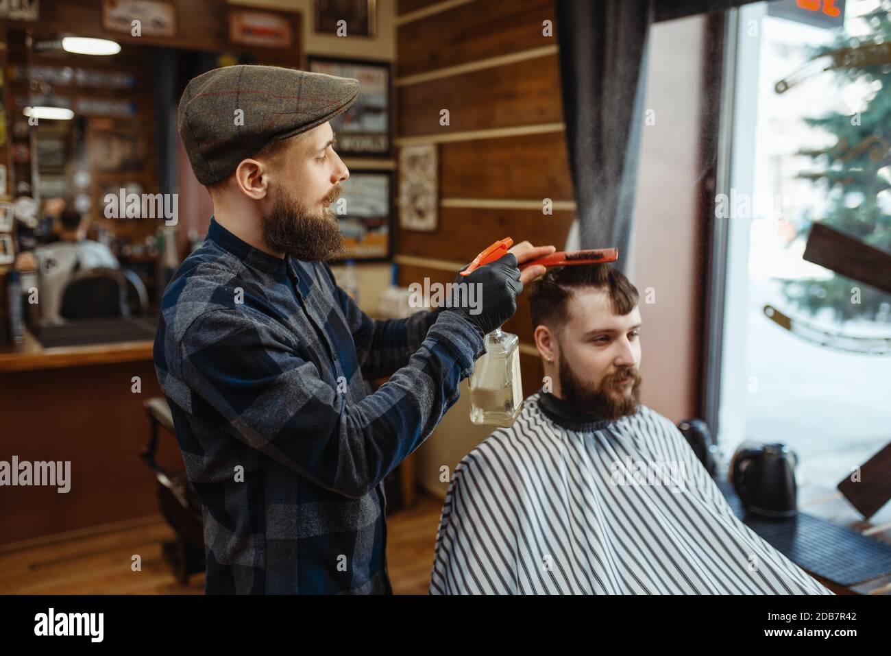 Male barber makes haircut electric hi-res stock photography and images ...