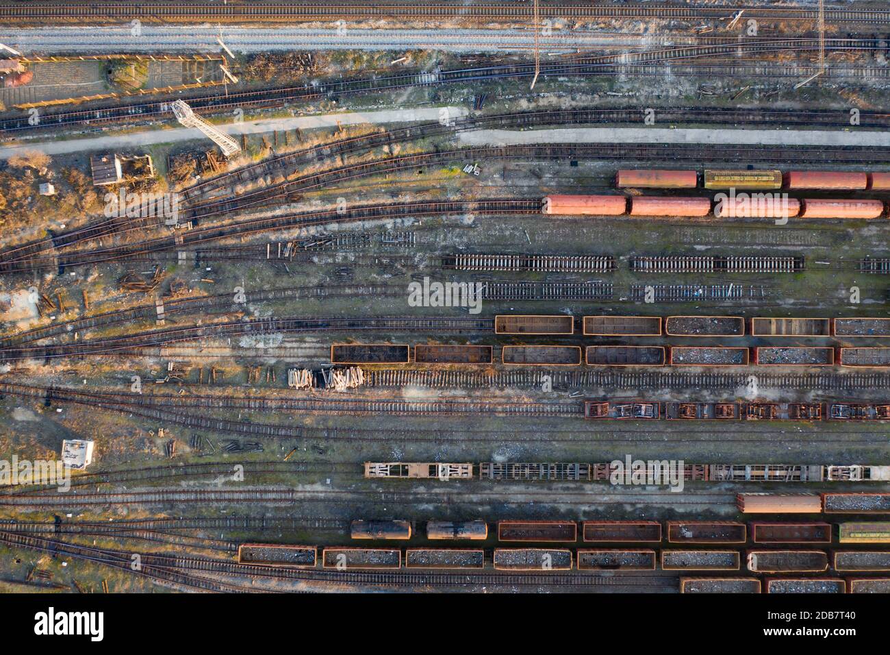 Aerial view of various railway carriage trains with goods on the ...