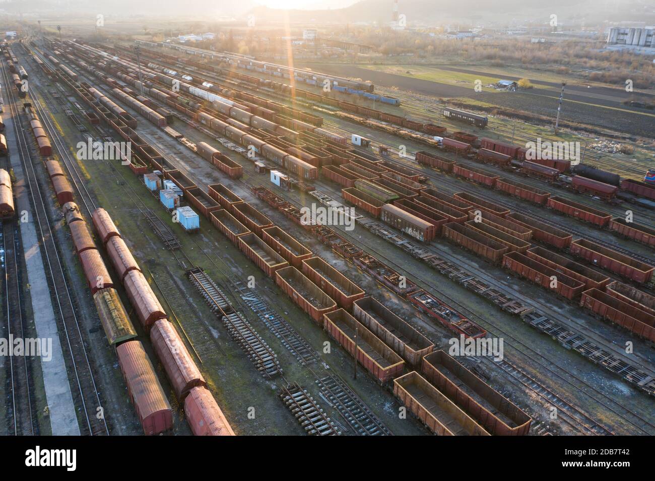 Aerial view of various railway carriage trains with goods on the ...