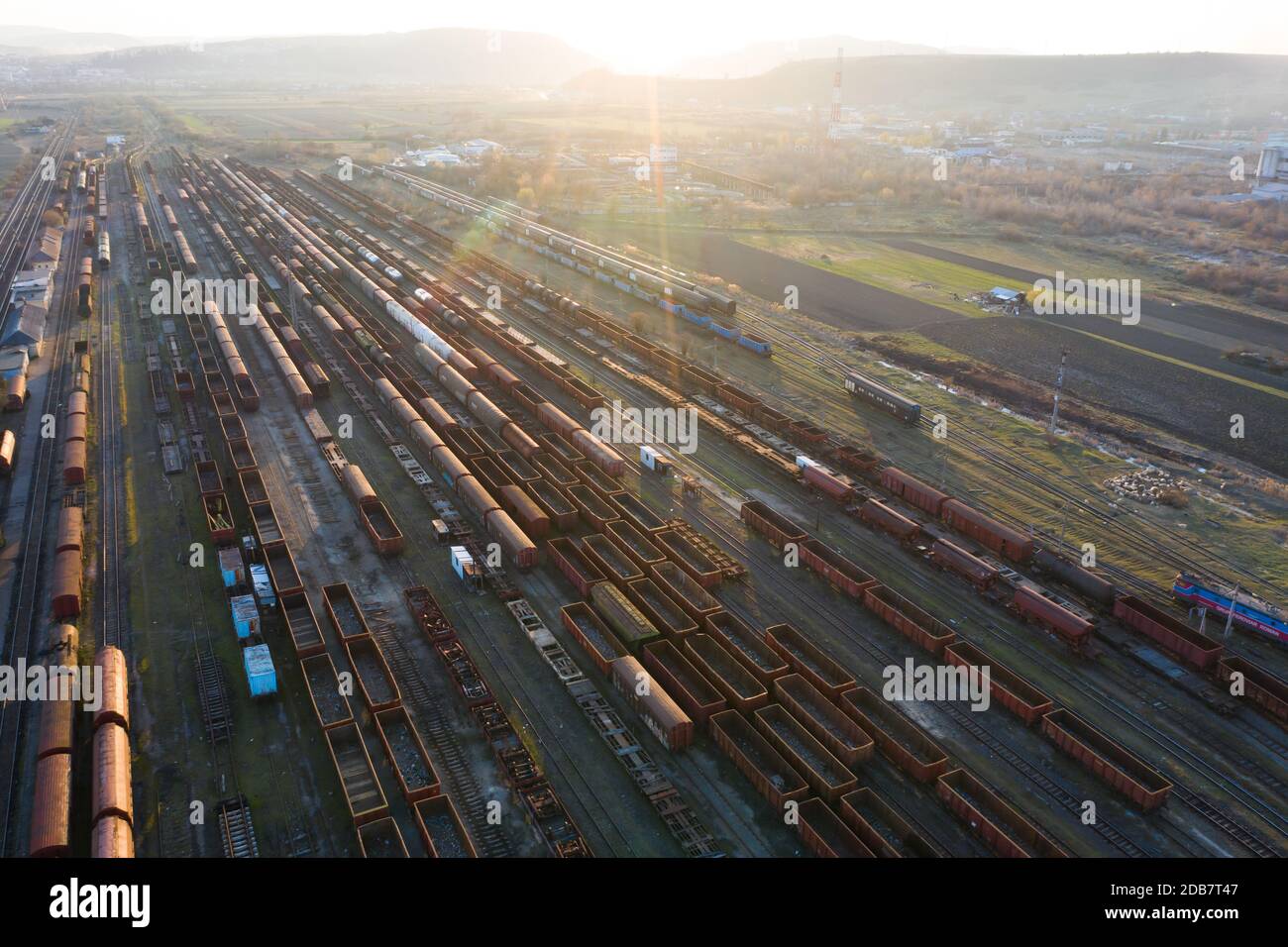 Aerial view of various railway carriage trains with goods on the ...