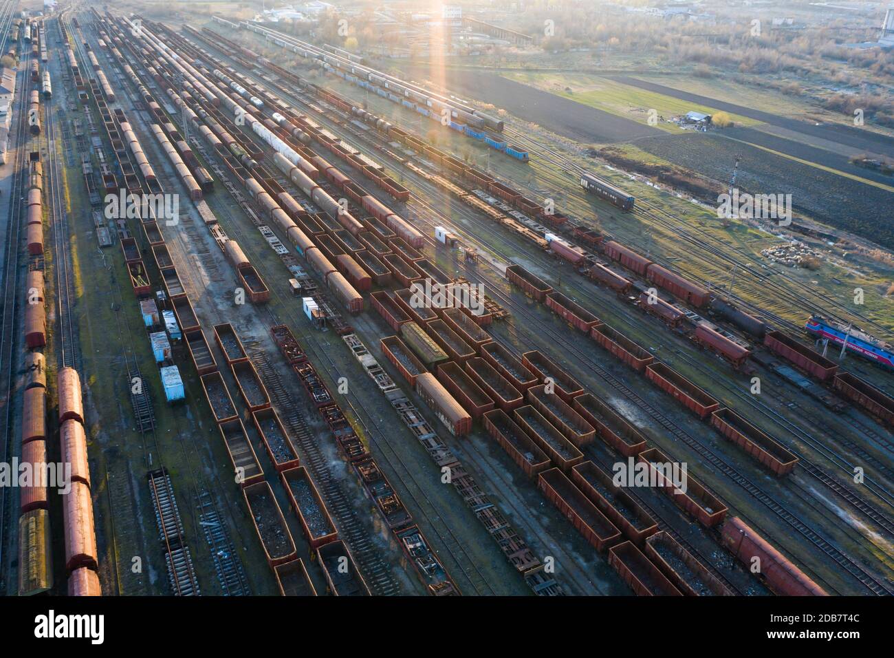 Aerial view of various railway carriage trains with goods on the ...