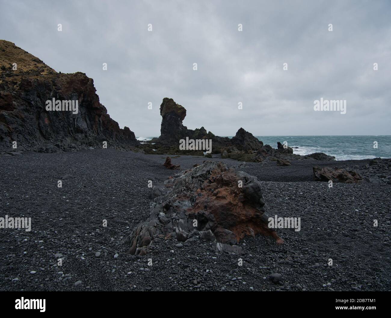 Boulders of volcanic rock on beach hi-res stock photography and images ...