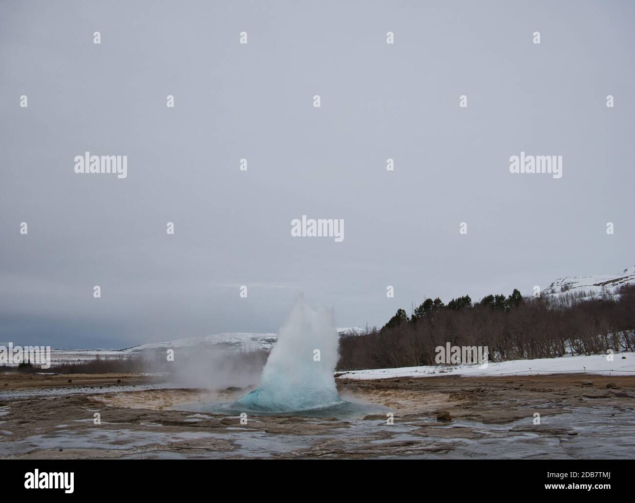 The blue water bubble from Strokkur Geyser in Iceland shortly before ...
