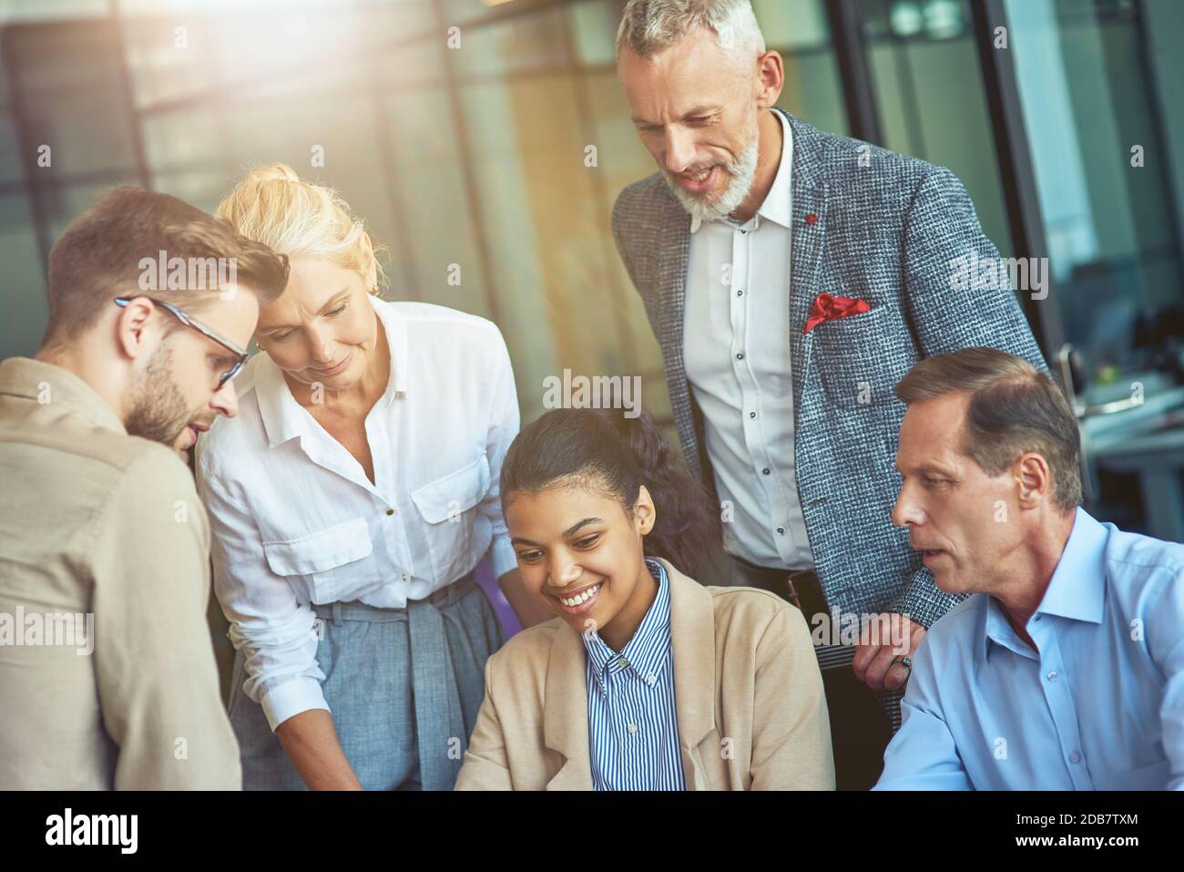 Business team. Group of multiracial colleagues working together in the ...