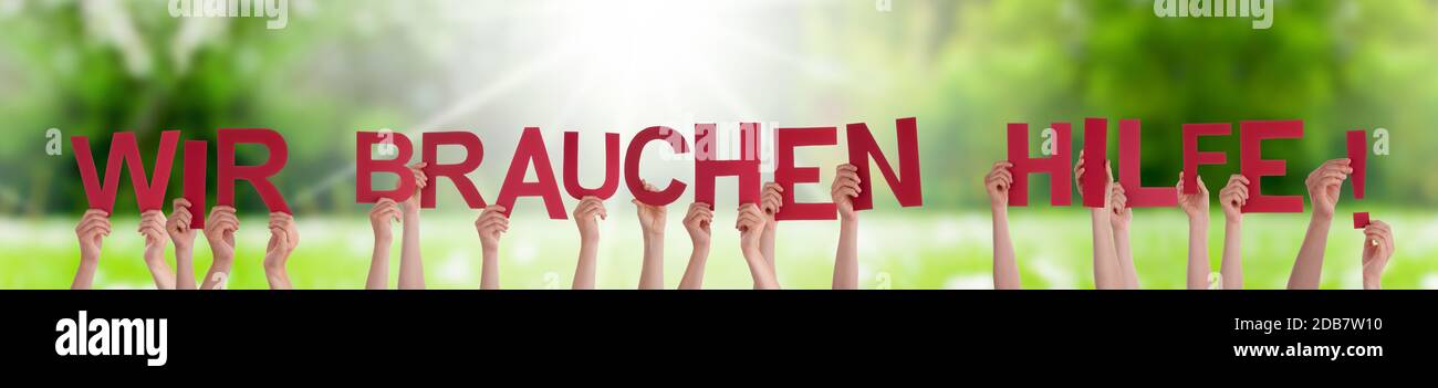 People Hands Holding Colorful German Word Wir Brauchen Hilfe Means We ...