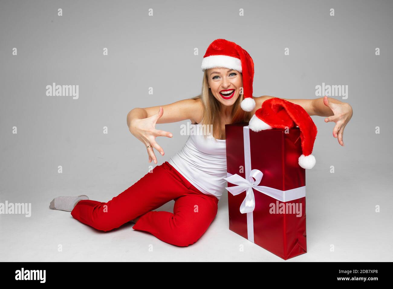 Christmas concept photo of jolly lady with huge gift box Stock Photo ...