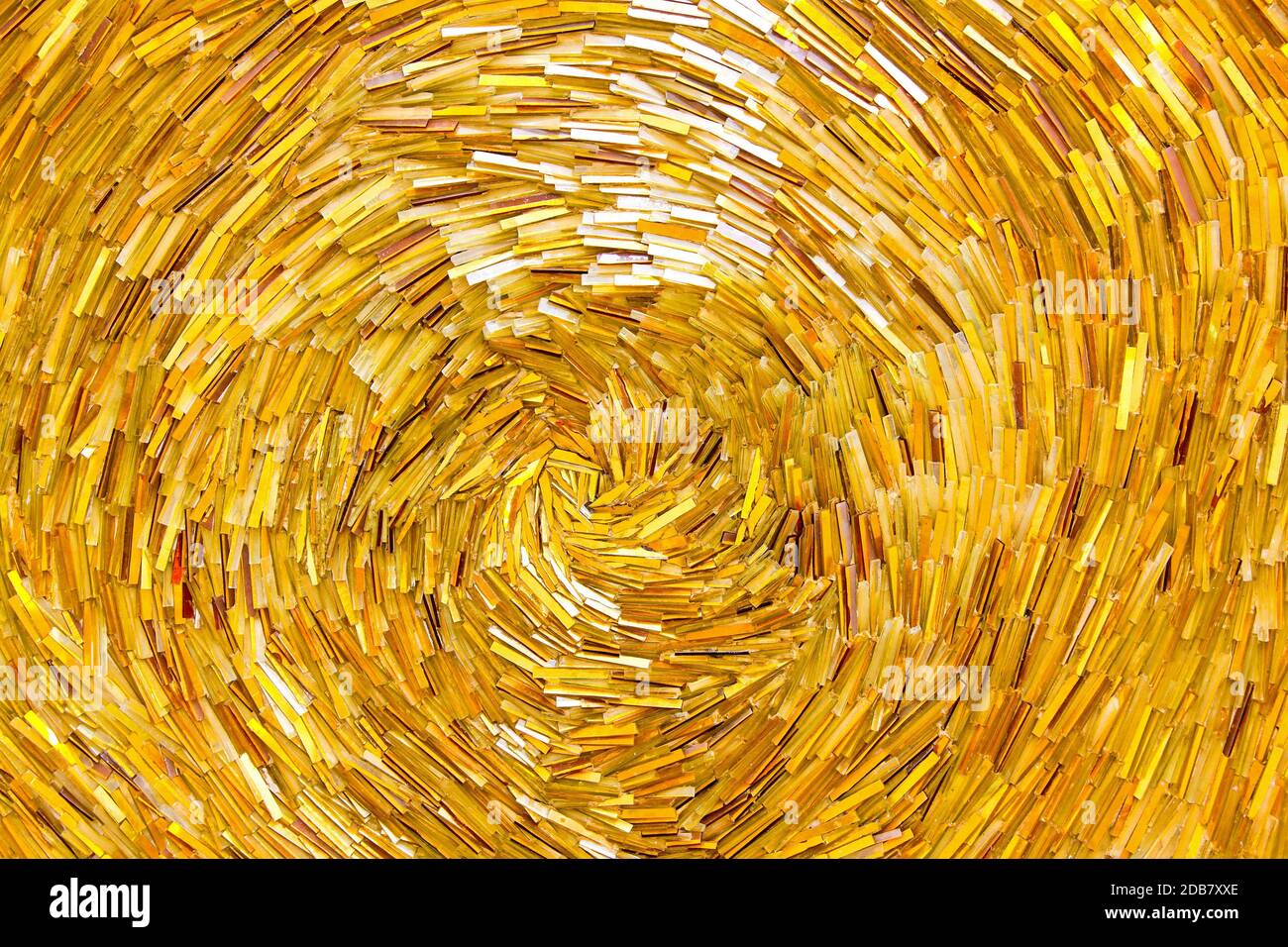 Detail of gold spiral texture with straws Stock Photo - Alamy