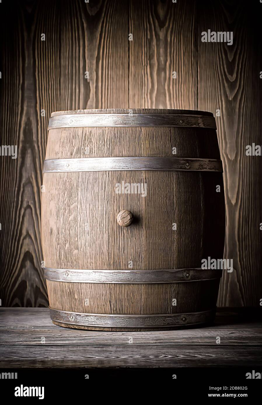 Old brown wooden barrel on wooden background Stock Photo - Alamy