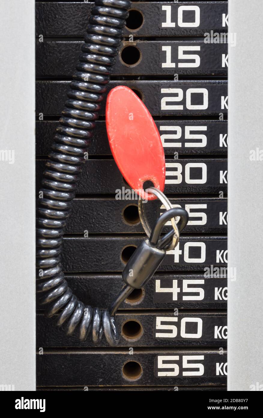 Detail trainer weight lifting with a lock Stock Photo - Alamy
