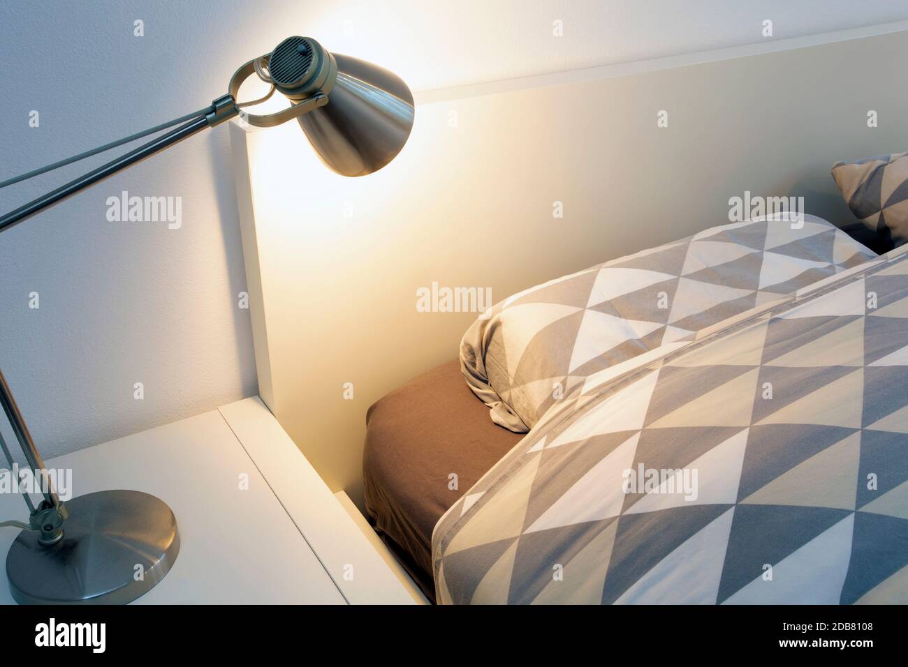 Modern Night Lamp next to bed retro design, lamp on night table close ...