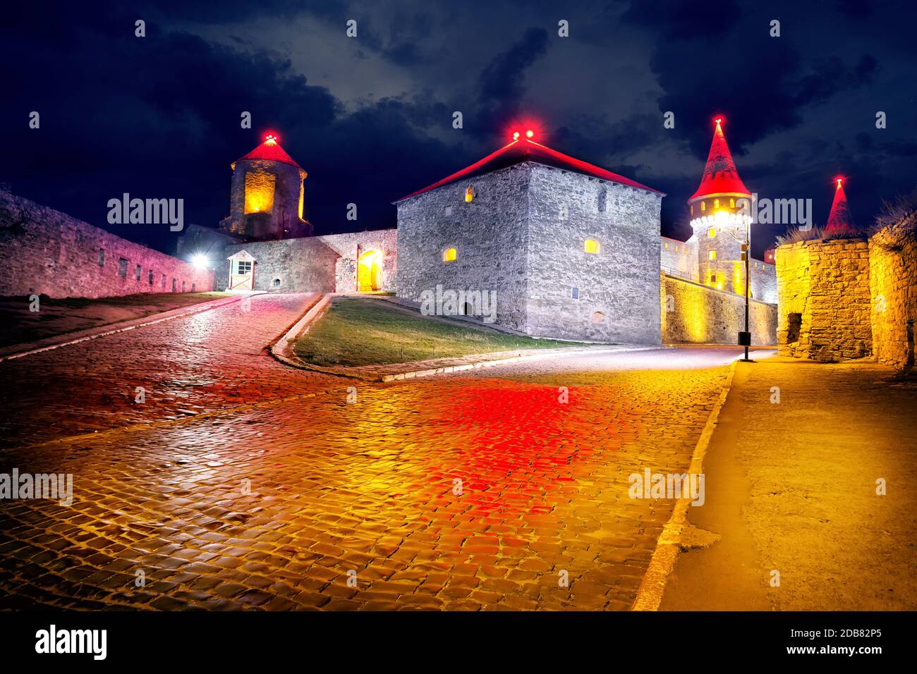 Old Castle on road to tower at night Stock Photo - Alamy