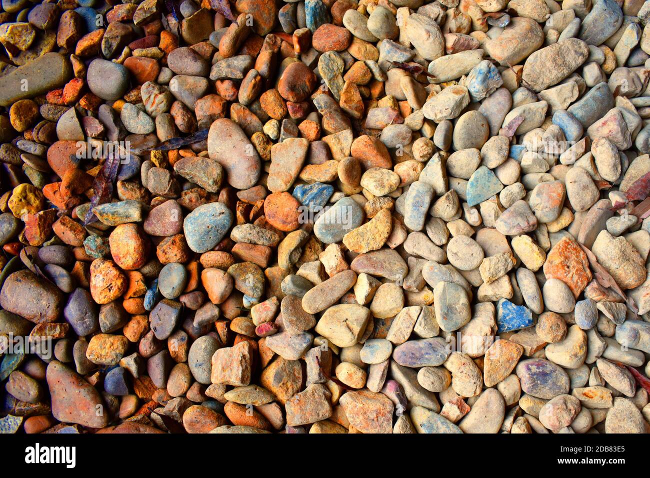 Wet and Dry Pebbles Stock Photo - Alamy
