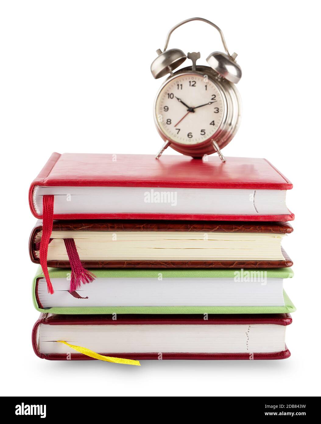 Stack of notebooks with bookmarks and alarm clock isolated on white ...
