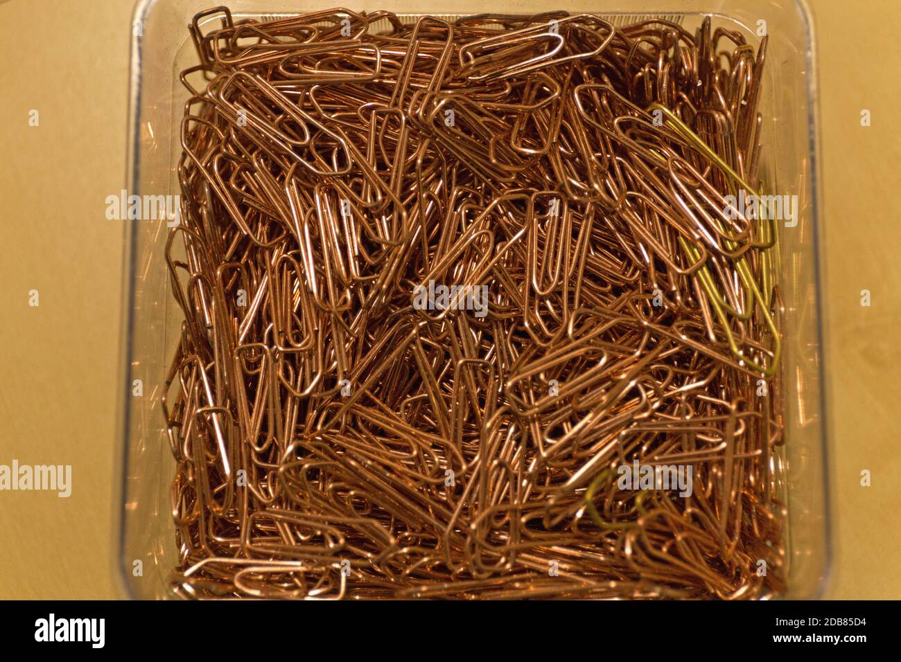 Bunch of Paper Clips in Box at Desk Stock Photo - Alamy
