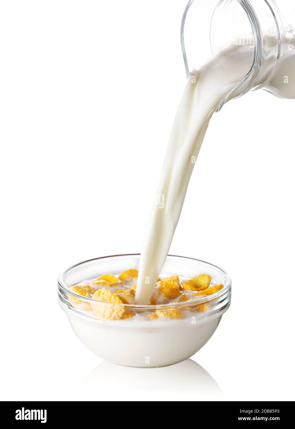 Corn flakes with flowing milk isolated on white background Stock Photo ...
