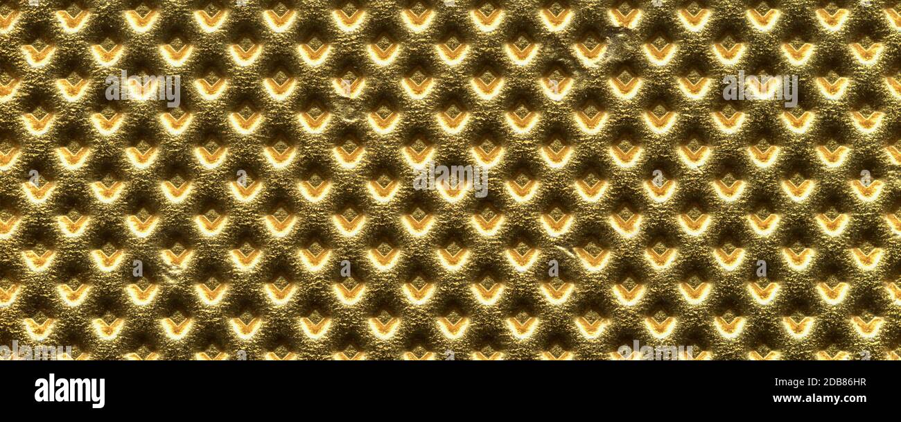 wide embossed gold metal texture useful as a background Stock Photo - Alamy
