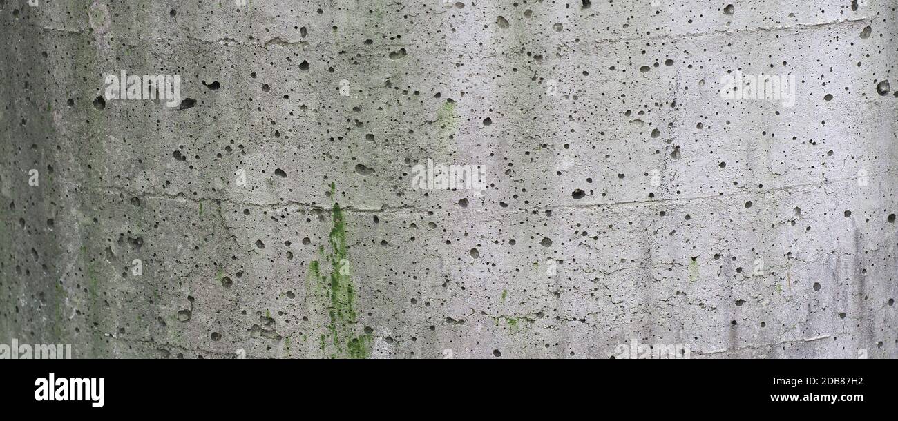 wide weathered grey concrete with moss texture useful as a background ...