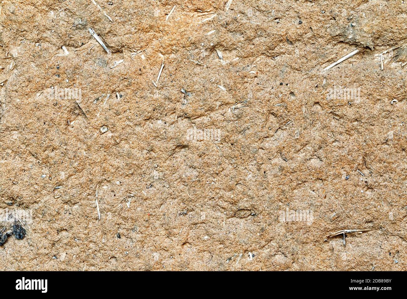 The old cracked clay wall. Clay background Stock Photo - Alamy