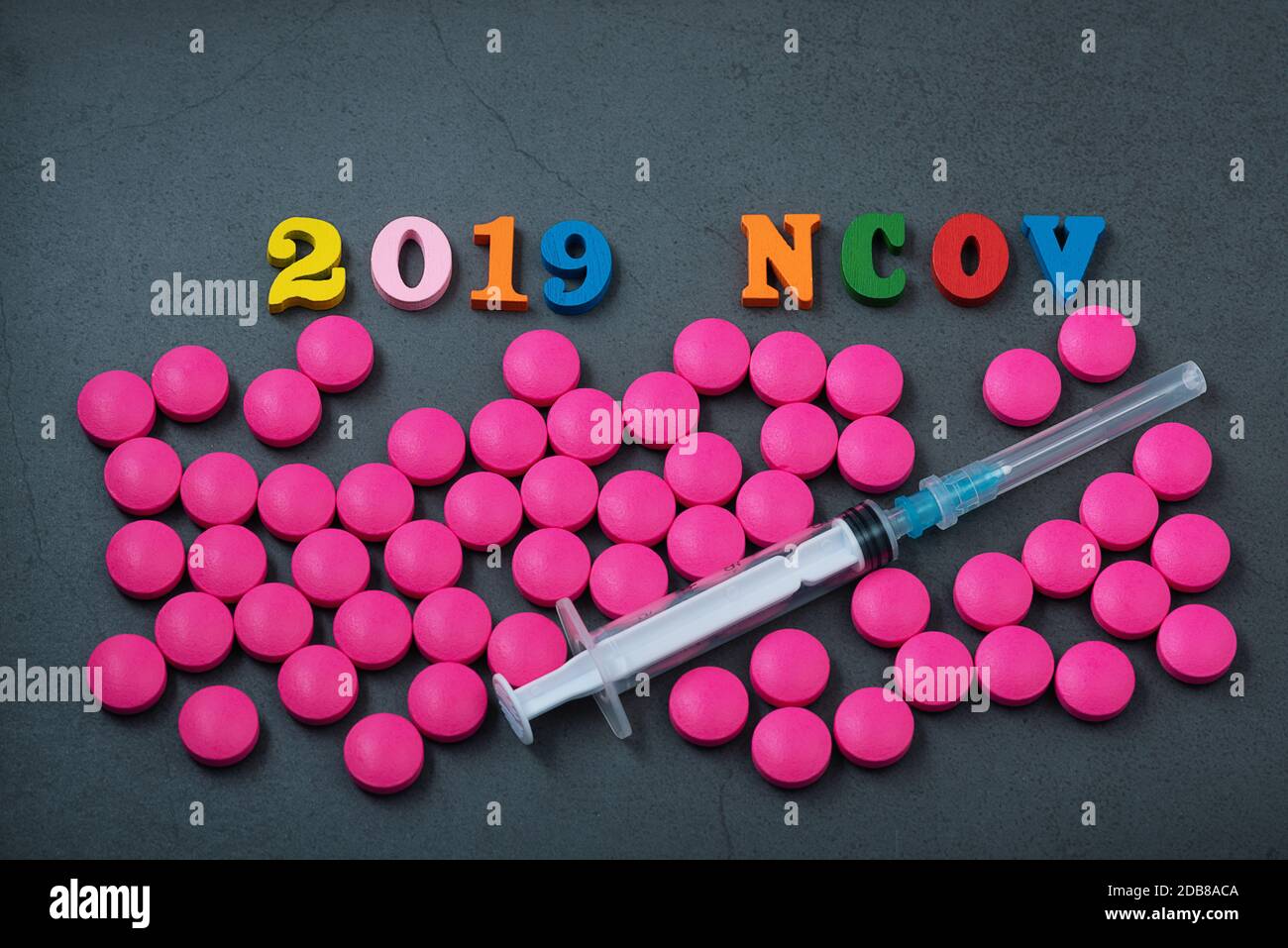 The name of the Chinese flu, its abbreviation. Pink pills and a syringe ...