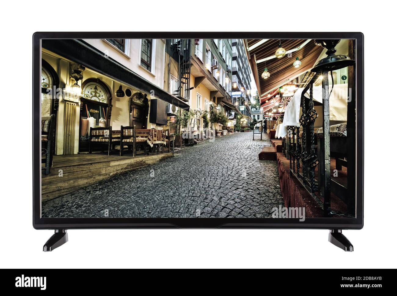 A high-definition TV with street picture of the city and stone road ...